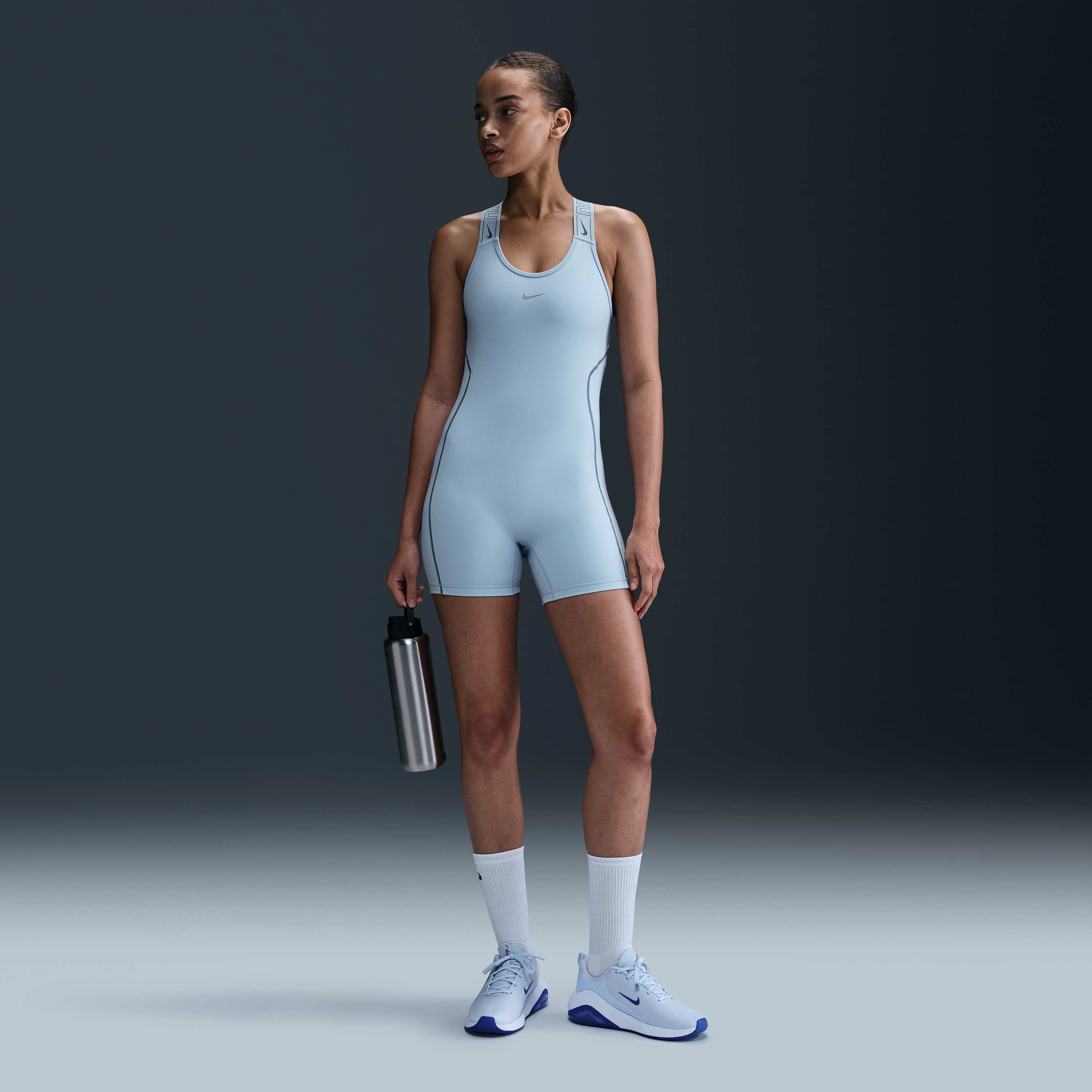 Buy Nike Women's Dri-FIT Bodysuit - Light Armoury Blue @ Nike Qatar