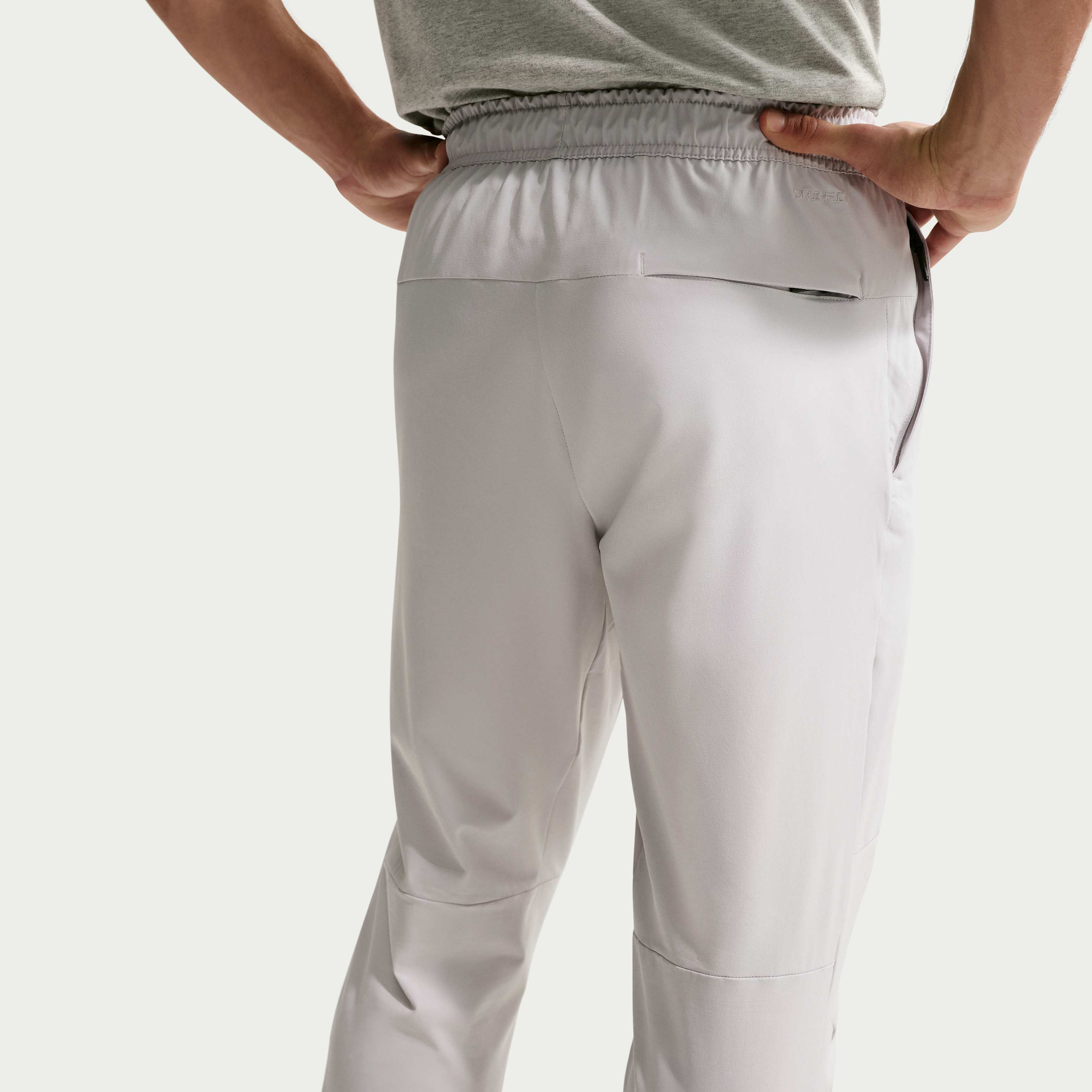 Buy Nike Unlimited Men's Dri-FIT Zip Cuff Versatile Trousers - Grey Fog ...