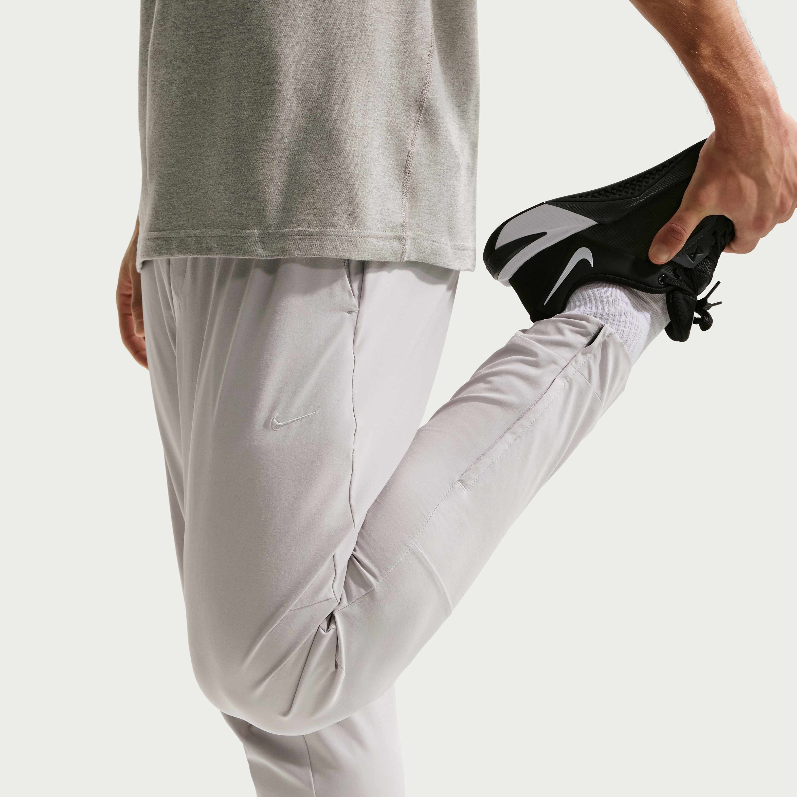 Buy Nike Unlimited Men's Dri-FIT Zip Cuff Versatile Trousers - Grey Fog ...